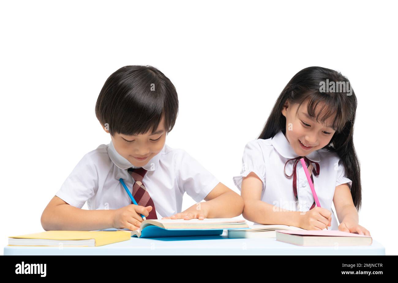 The little boy and little girl in the study Stock Photo - Alamy