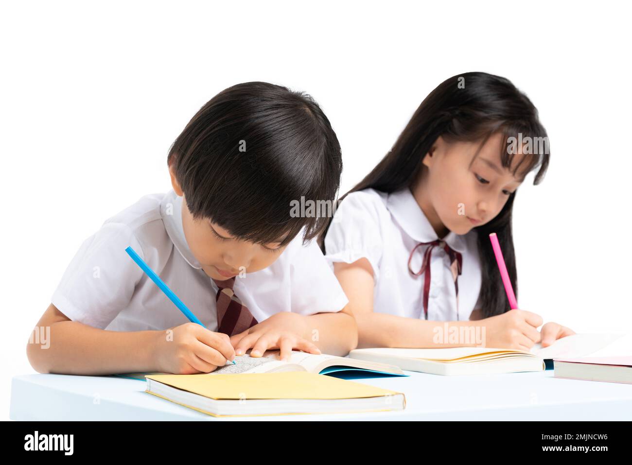 The little boy and little girl in the study Stock Photo - Alamy