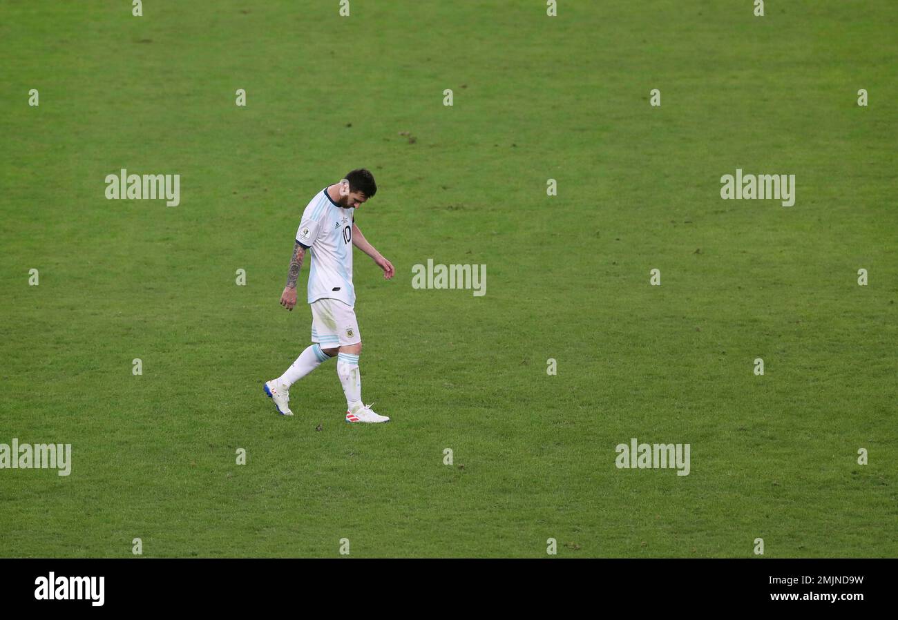 Argentina's Lionel Messi walks out of the pitch at the half time during ...
