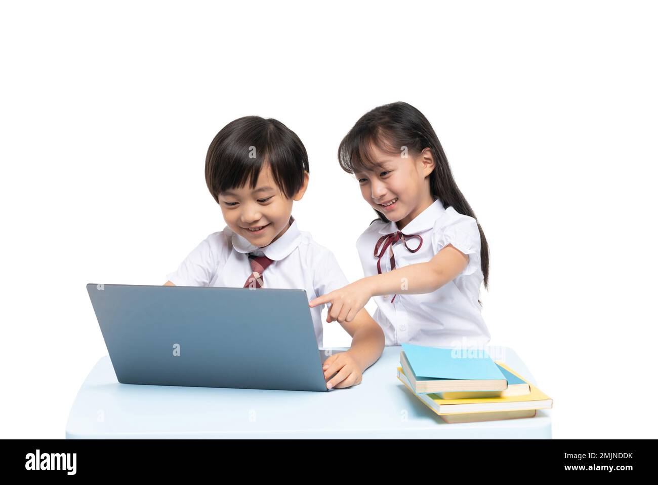The little boy and little girl in the study Stock Photo - Alamy