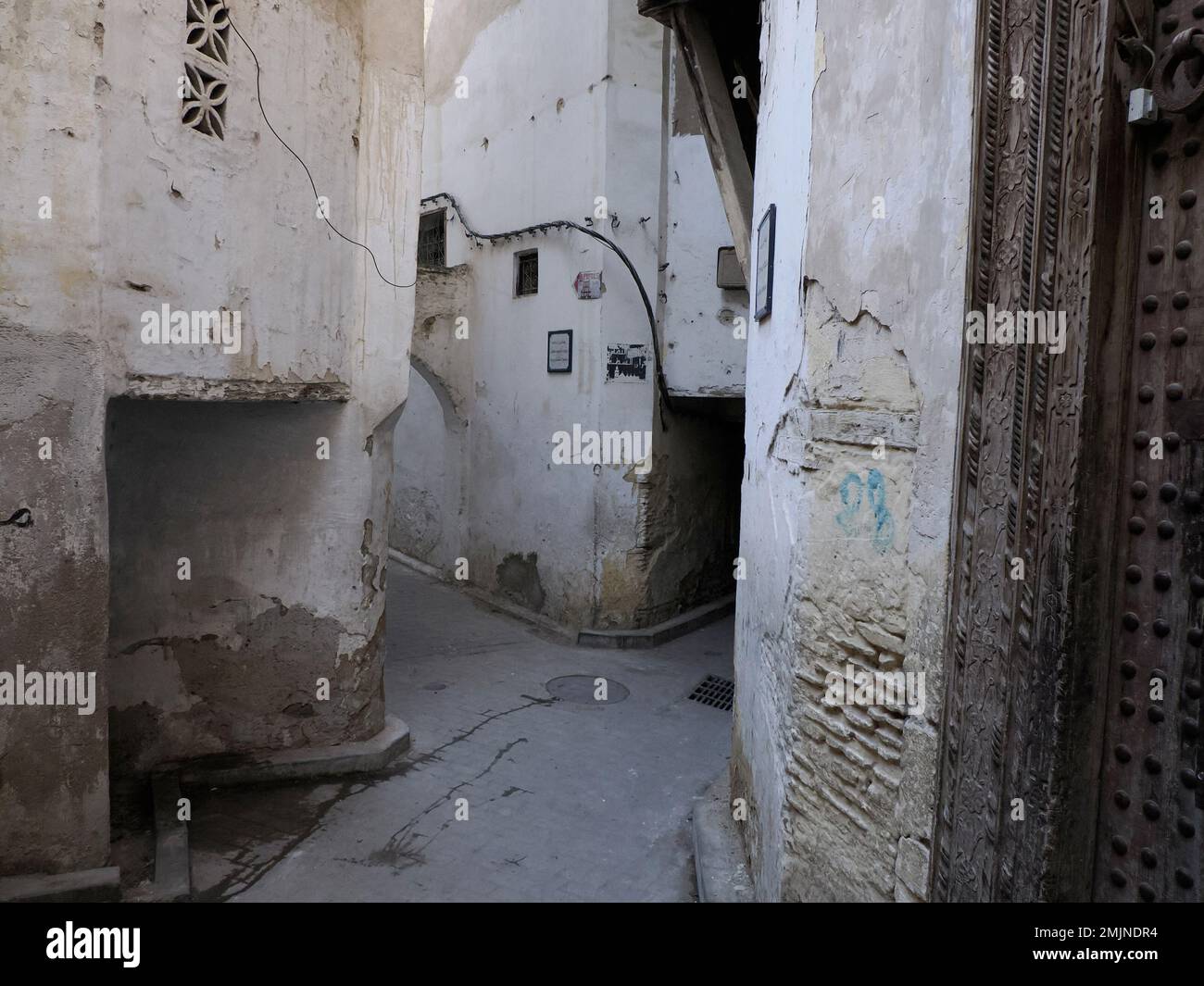 A Small street in Fez Fes medieval medina (old town). Morocco Stock ...