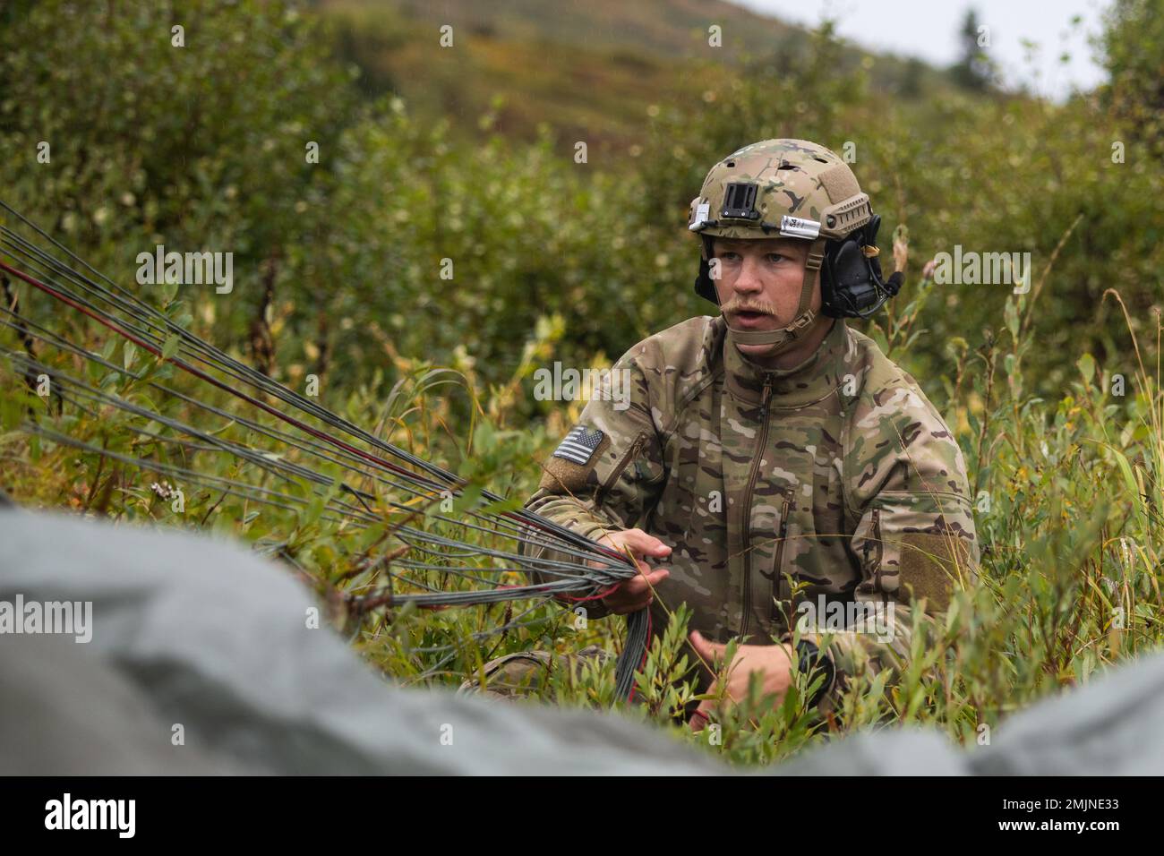 An Air Force tactical air control party specialist, assigned to ...