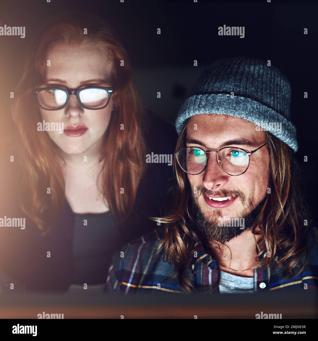 Working towards their big picture goals. a business team looking at a ...