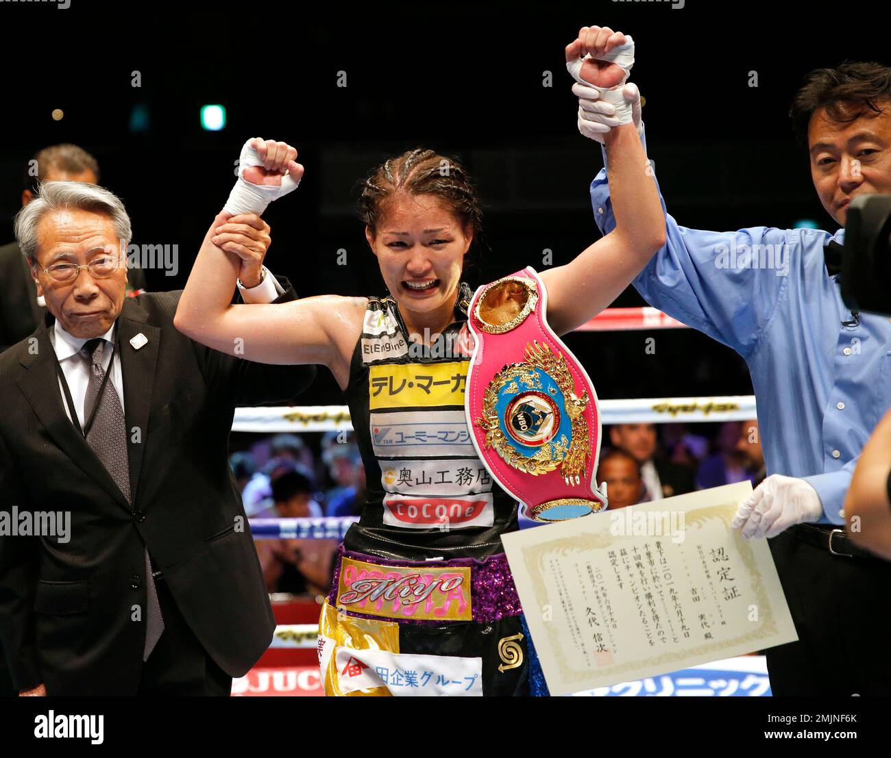 Japan's Miyo Yoshida is declared the winner after defeating Casey ...