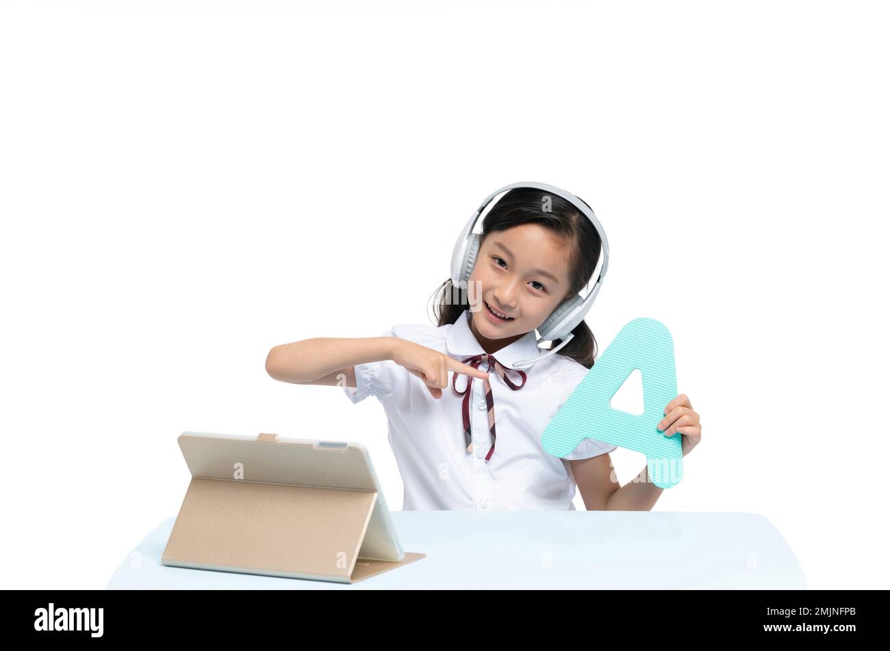Elementary school students in learning Stock Photo - Alamy