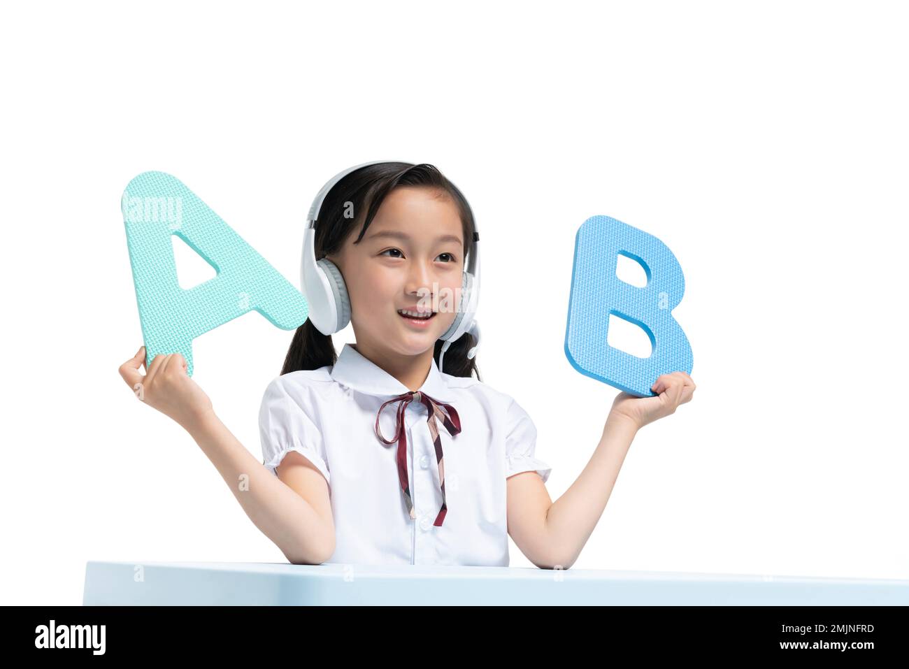 Elementary school students in learning Stock Photo - Alamy