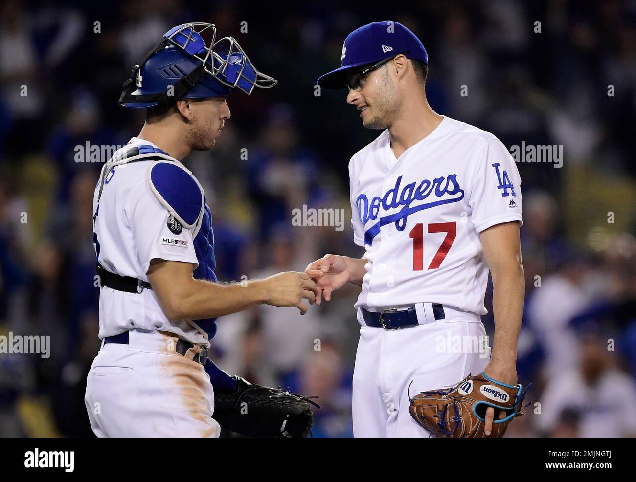 Los Angeles Dodgers catcher Austin Barnes, left, and relief pitcher Joe ...