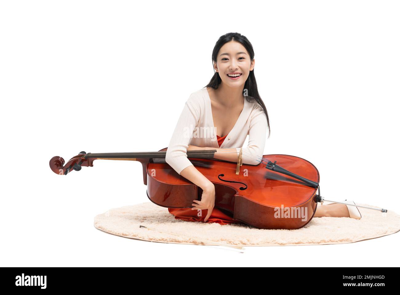 A young woman and the cello Stock Photo - Alamy