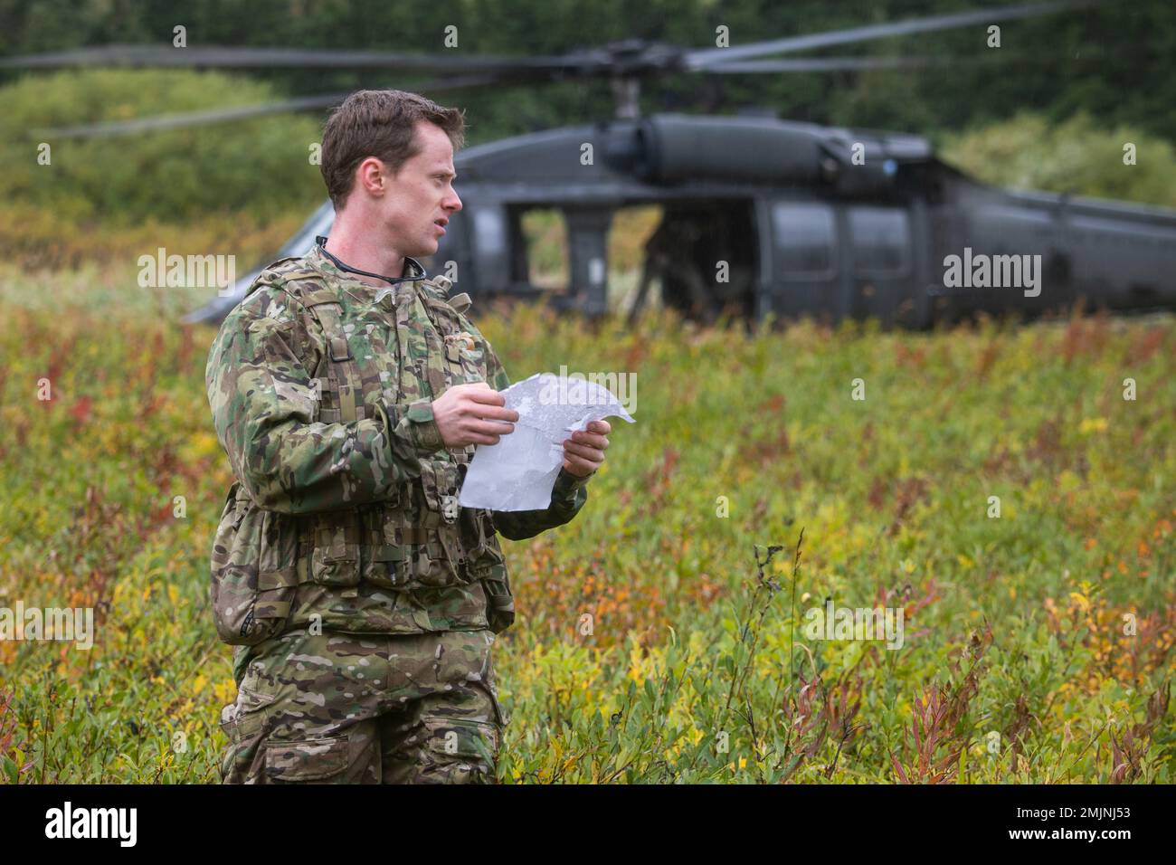 Air Force Staff Sgt. Derek Bolton, a staff weather officer assigned to ...