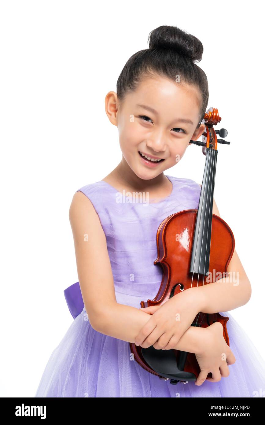 The female teacher guide girl playing Musical Instruments Stock Photo ...