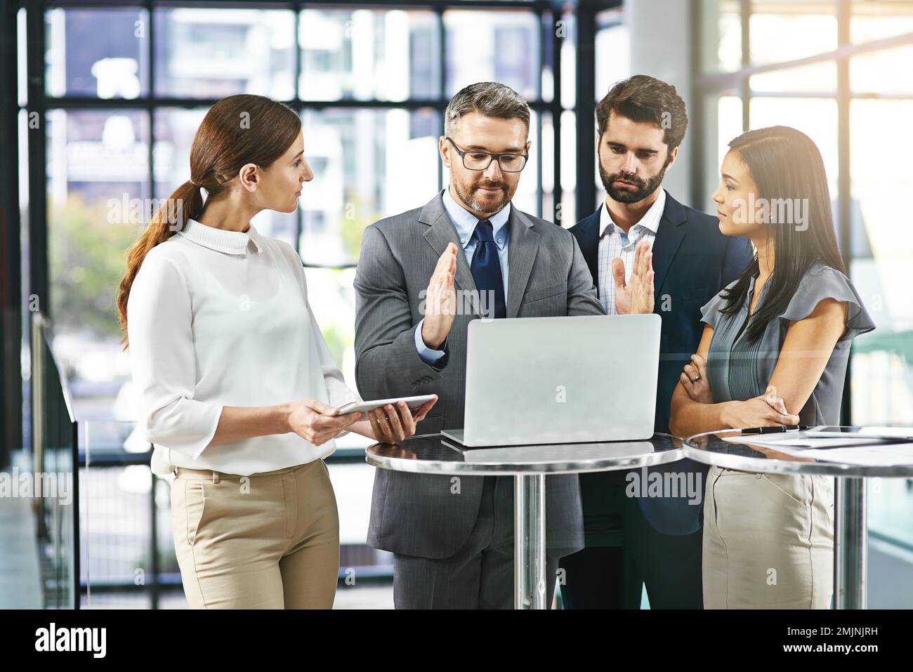 Teamwork enables your business to grow. a group of colleagues working ...