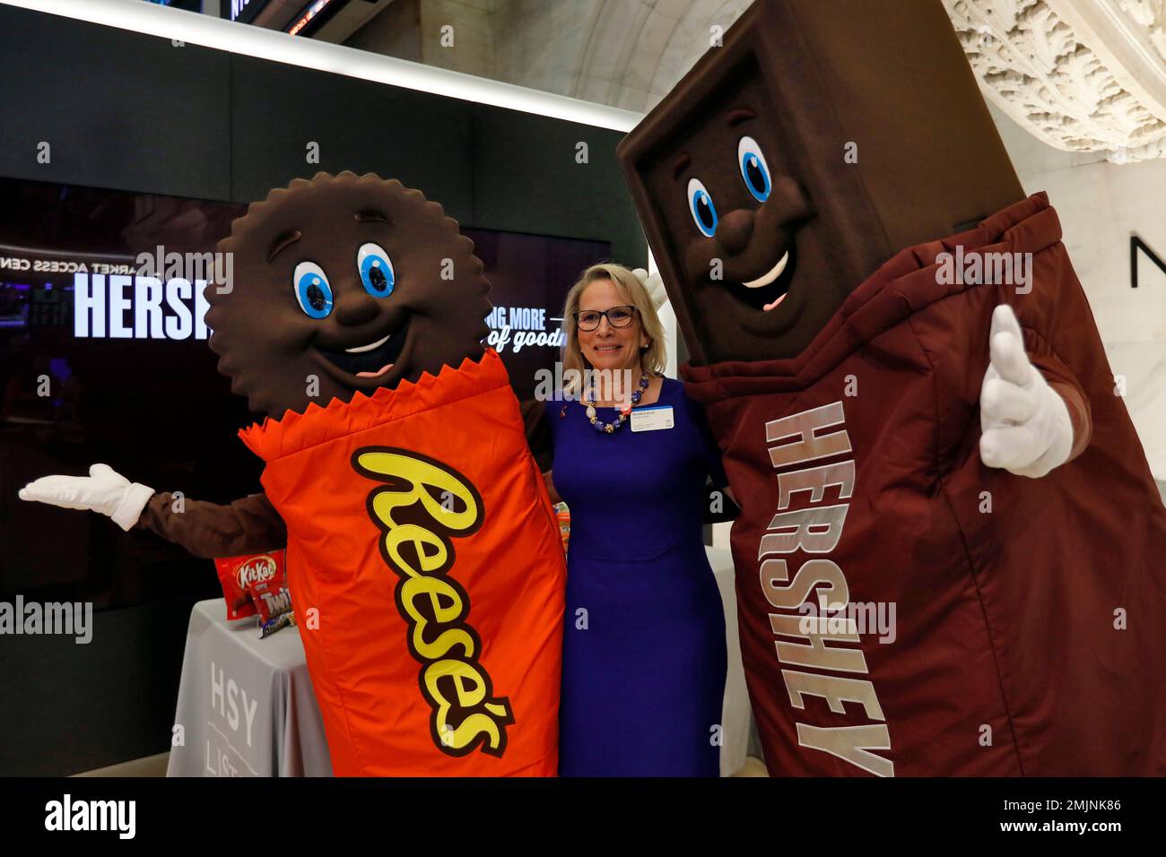Hershey Company President & CEO Michele Buck poses with candy mascots ...
