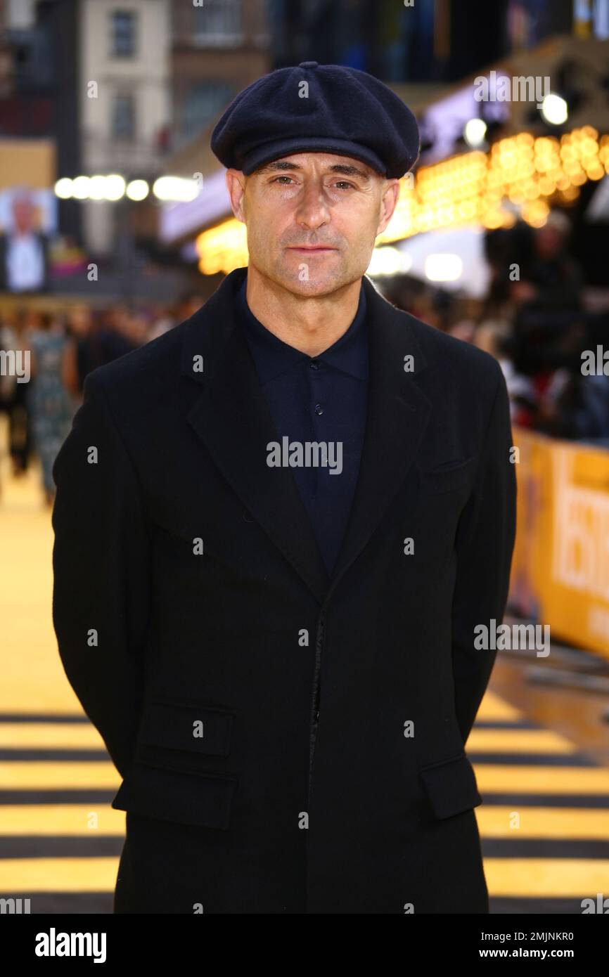 Actor Mark Strong poses for photographers upon arrival at the premiere ...