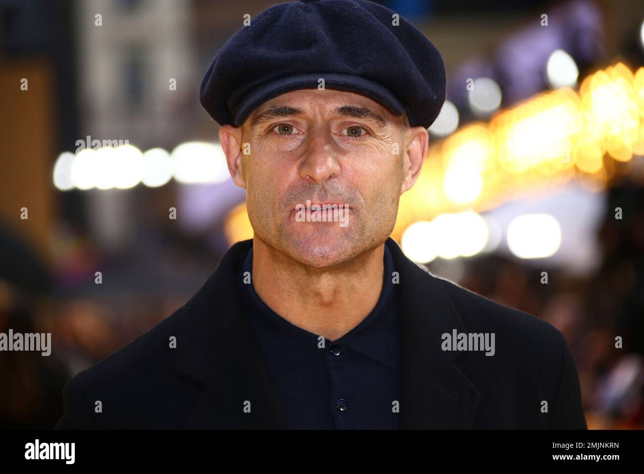 Actor Mark Strong poses for photographers upon arrival at the premiere ...