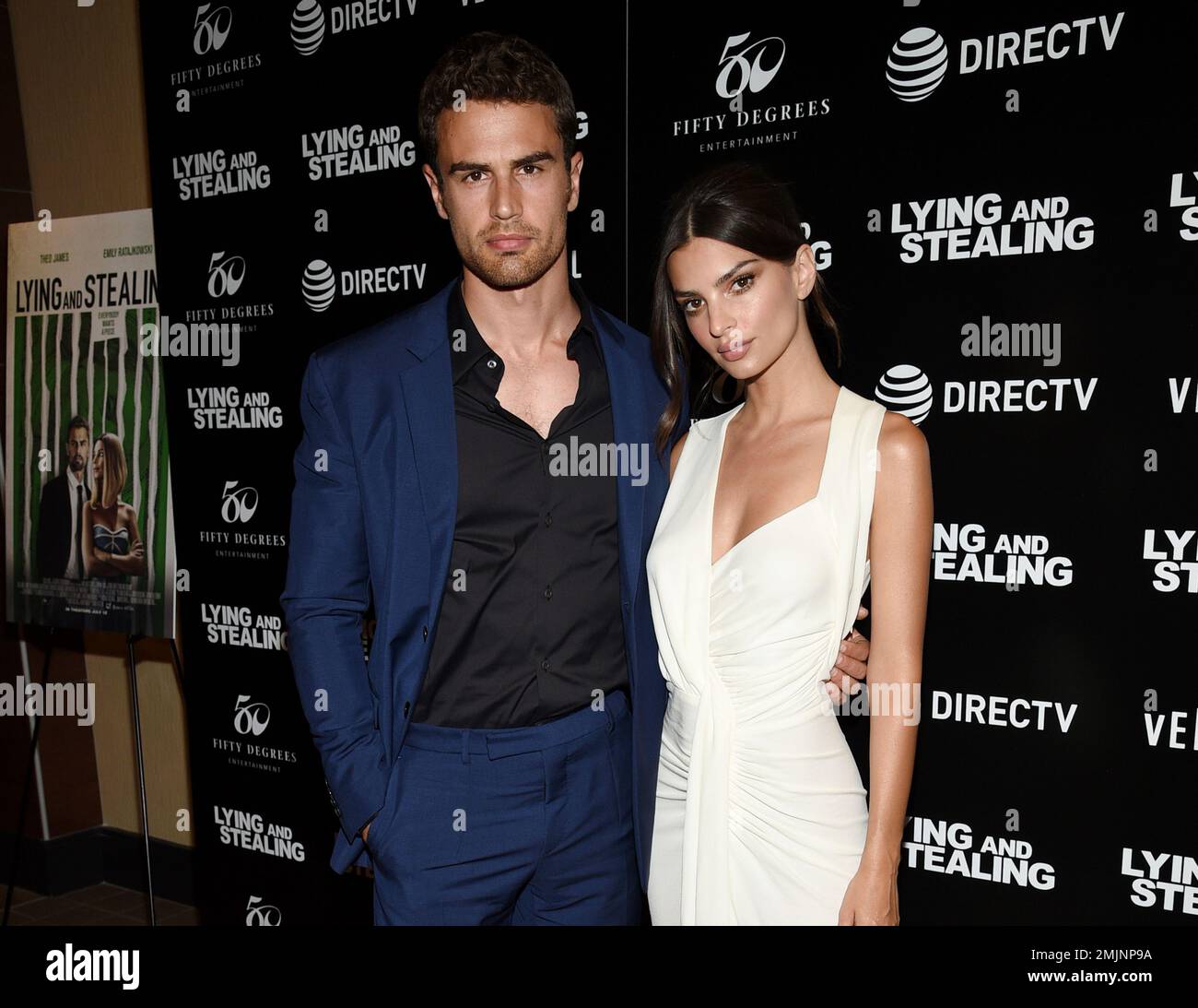 Actors Theo James, left, and Emily Ratajkowski pose together at a ...