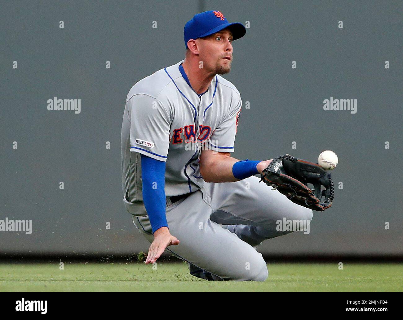 New York Mets left fielder Jeff McNeil cannot catch a ball hit for a ...