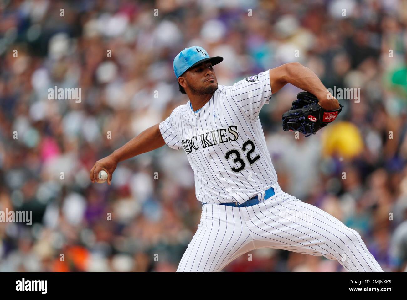 Colorado Rockies relief pitcher Jesus Tinoco works against the San ...