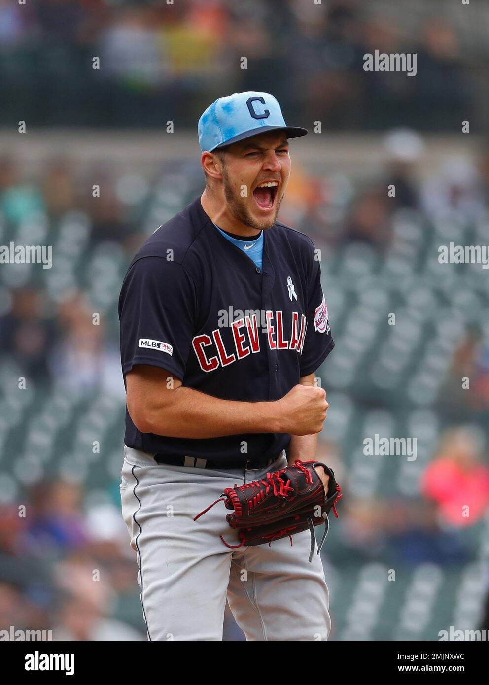Cleveland Indians pitcher Trevor Bauer reacts to striking out Detroit ...
