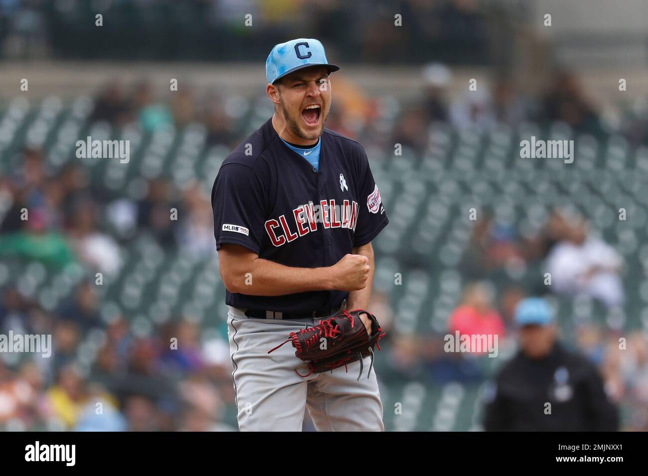 Cleveland Indians pitcher Trevor Bauer reacts to striking out Detroit ...