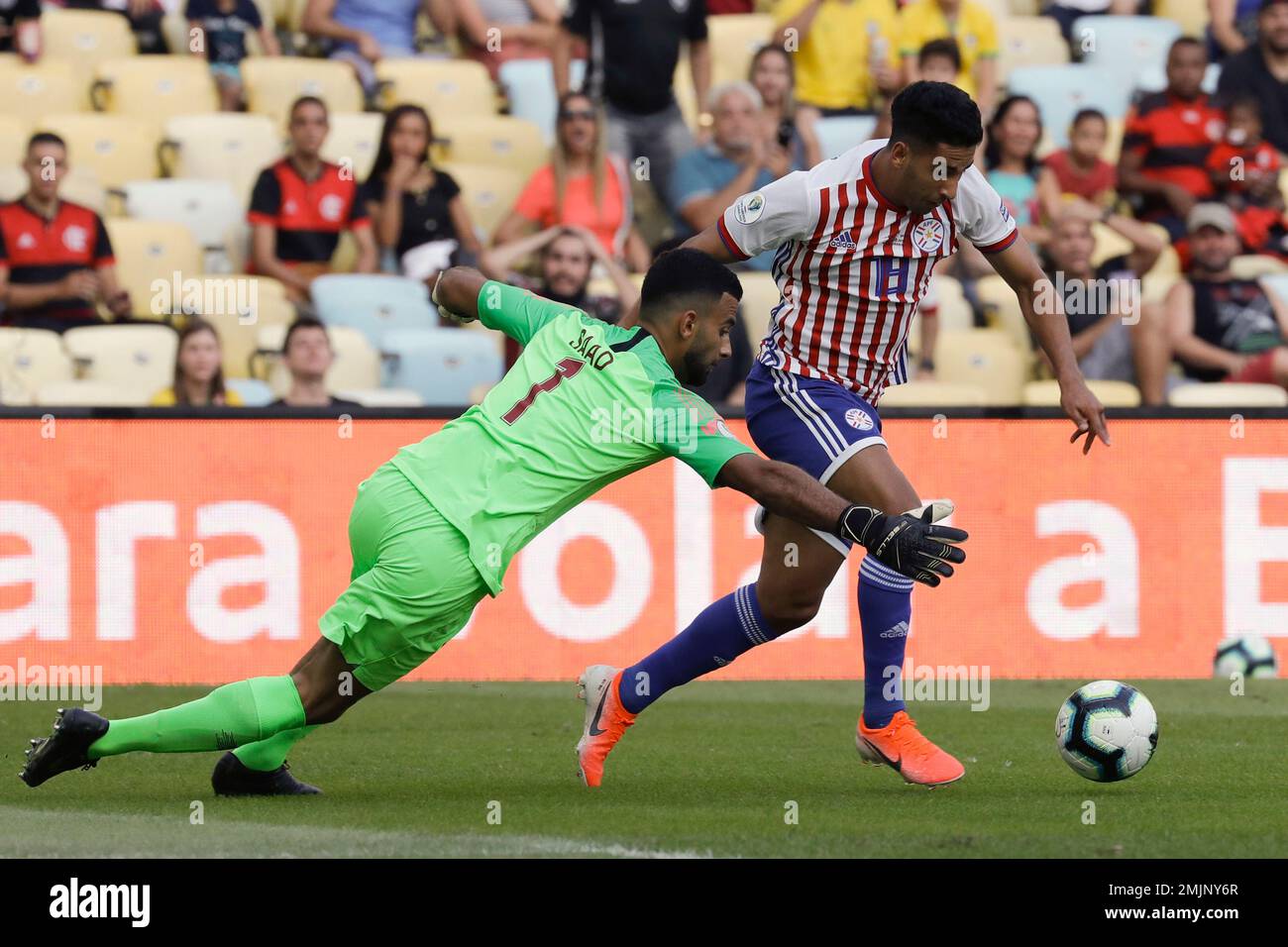 Qatar's goalkeeper Saad Al Sheeb challenges Paraguay's Cecilio ...