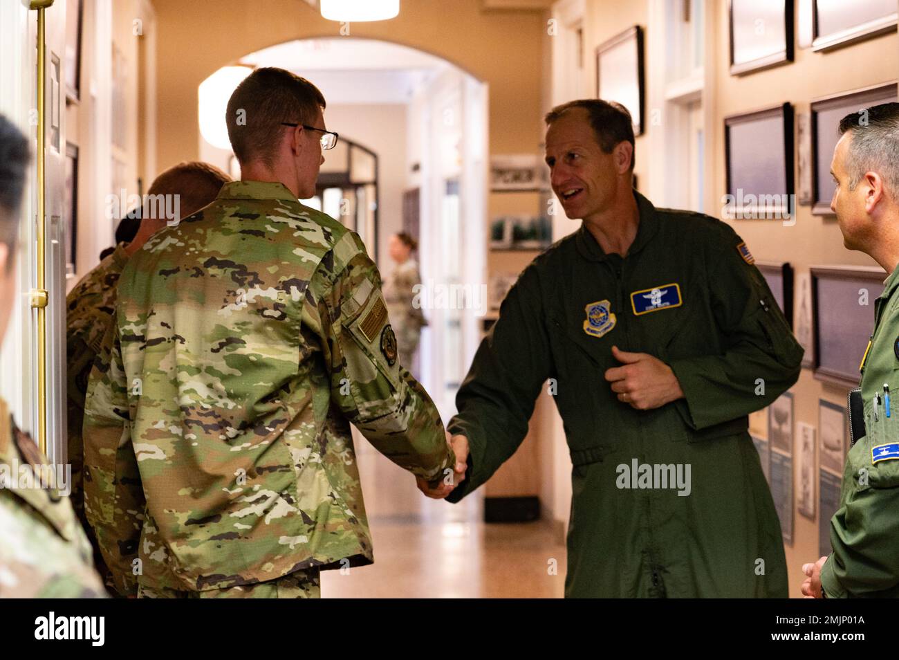 U.S. Air Force Maj. Gen. Corey Martin, 18th Air Force commander, coins ...