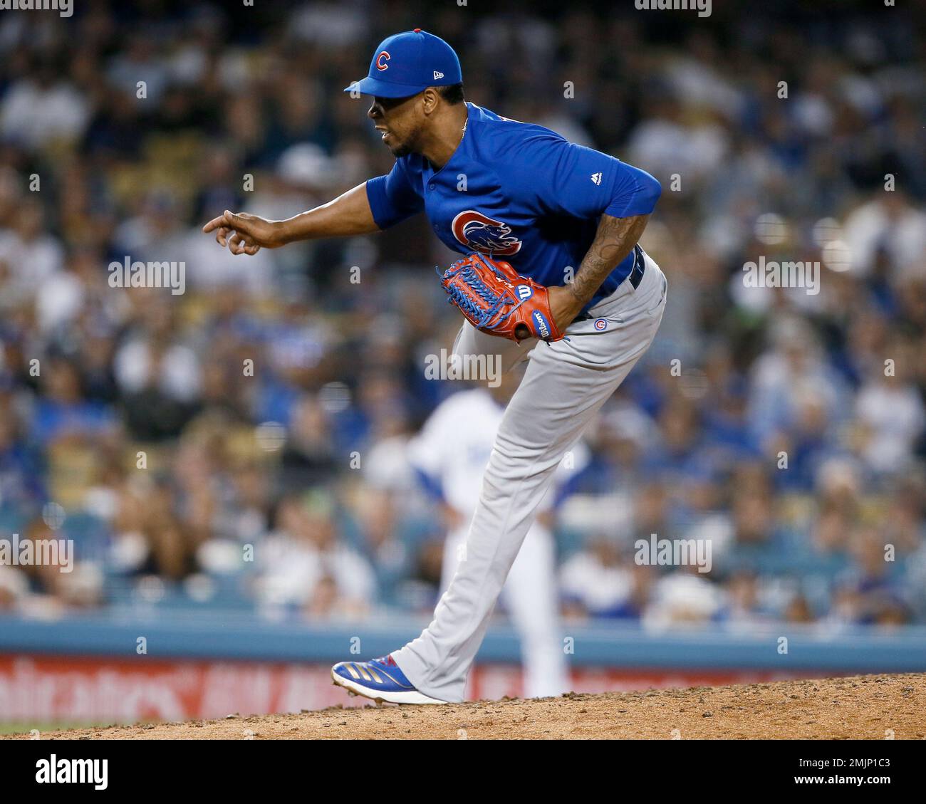 Chicago Cubs relief pitcher Pedro Strop follows through after ...