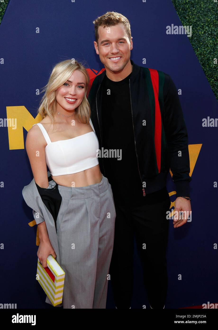 Cassie Randolph, left, and Colton Underwood arrive at the MTV Movie and ...