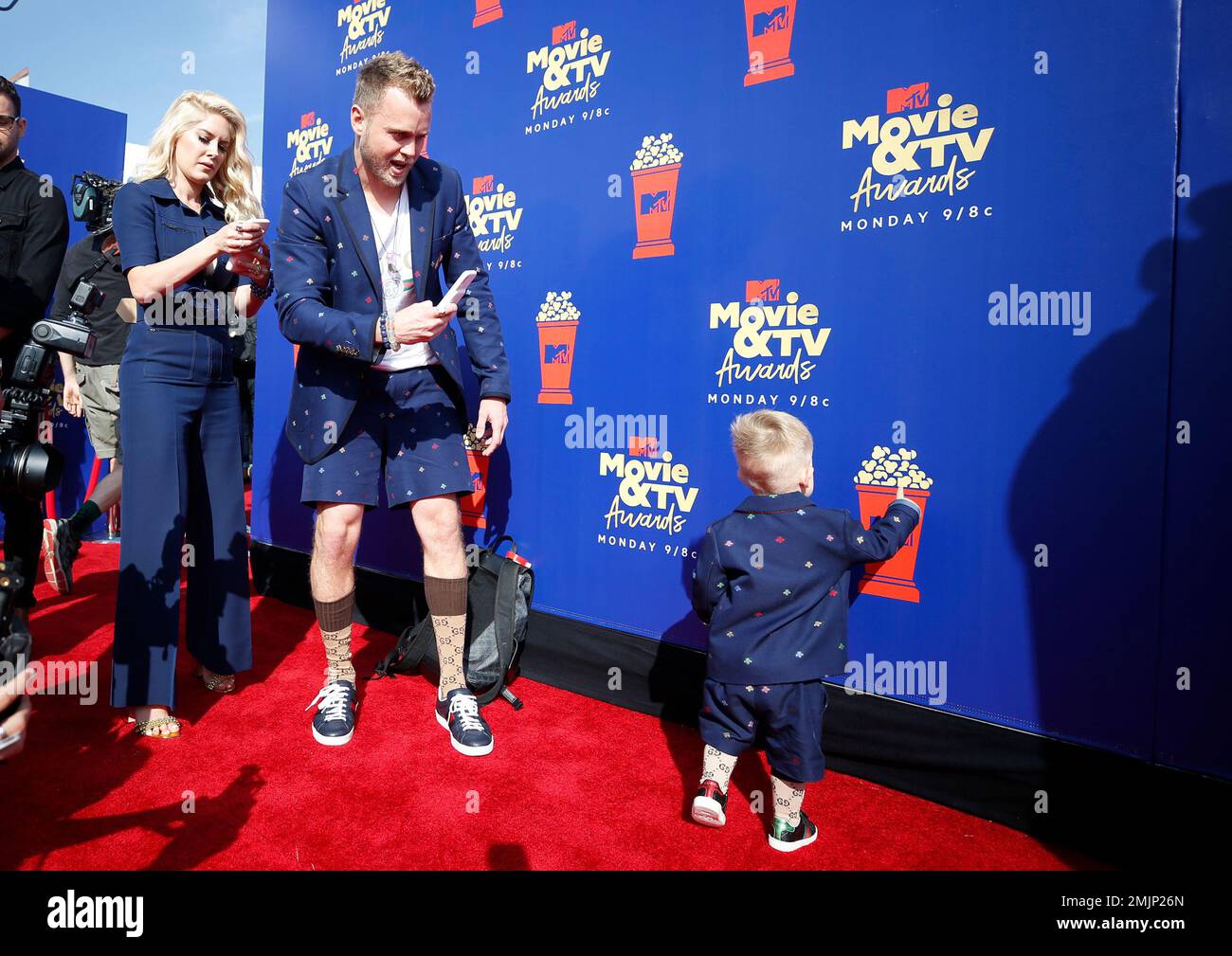 Heidi Pratt , from left, and Spencer Pratt take photos of Gunner Stone ...