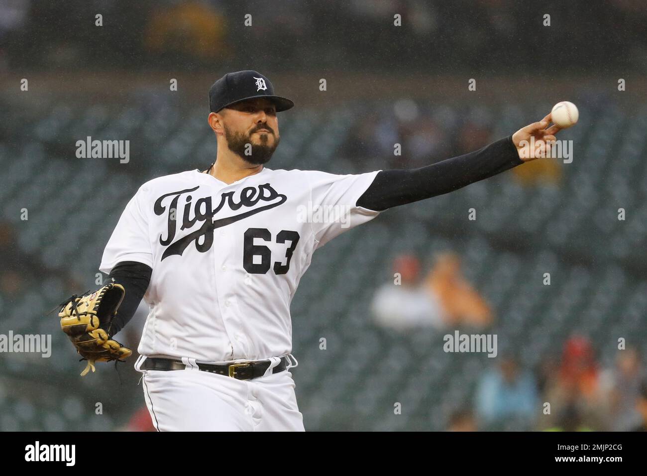 Detroit Tigers pitcher Nick Ramirez throws to first base in the seventh ...
