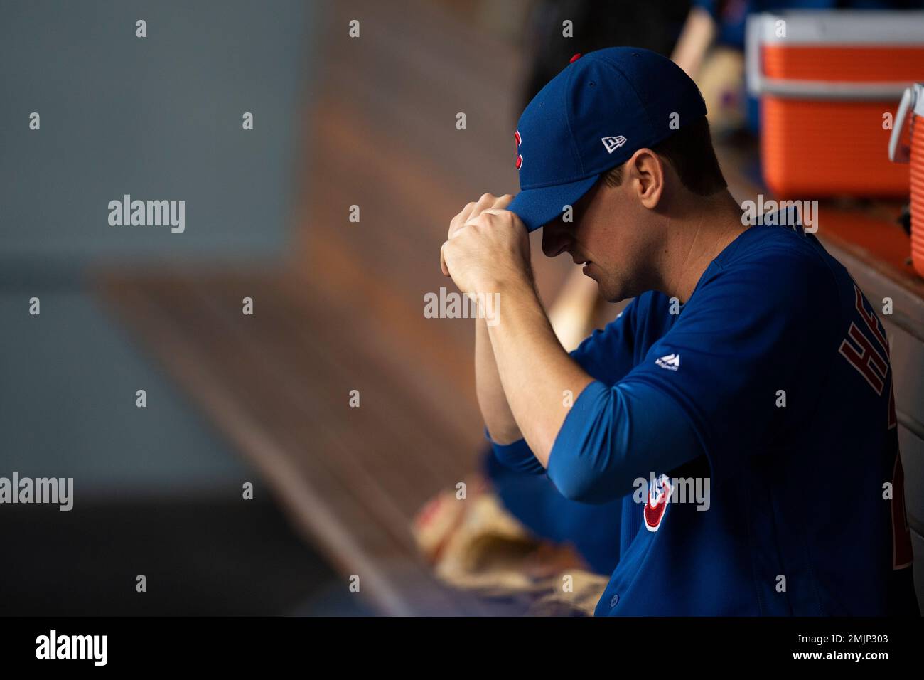 Chicago Cubs starting pitcher Kyle Hendricks fixes his cap before a ...