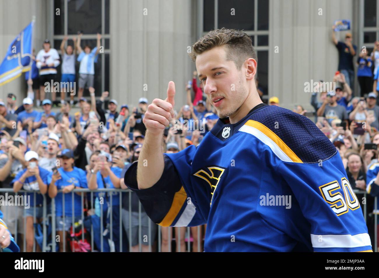 St. Louis Blues goaltender Jordan Binnington celebrates with fans ...