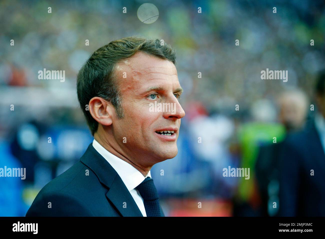 France's President Emmanuel Macron stands on the pitch prior to the Top ...