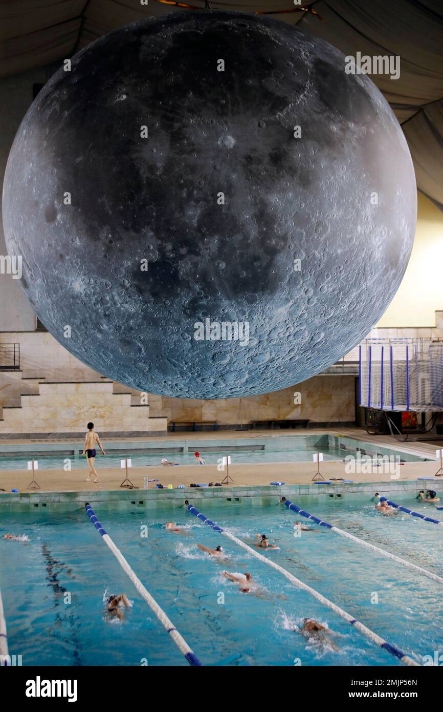 Swimmers practice as the installation 'Museum of the Moon', a seven ...