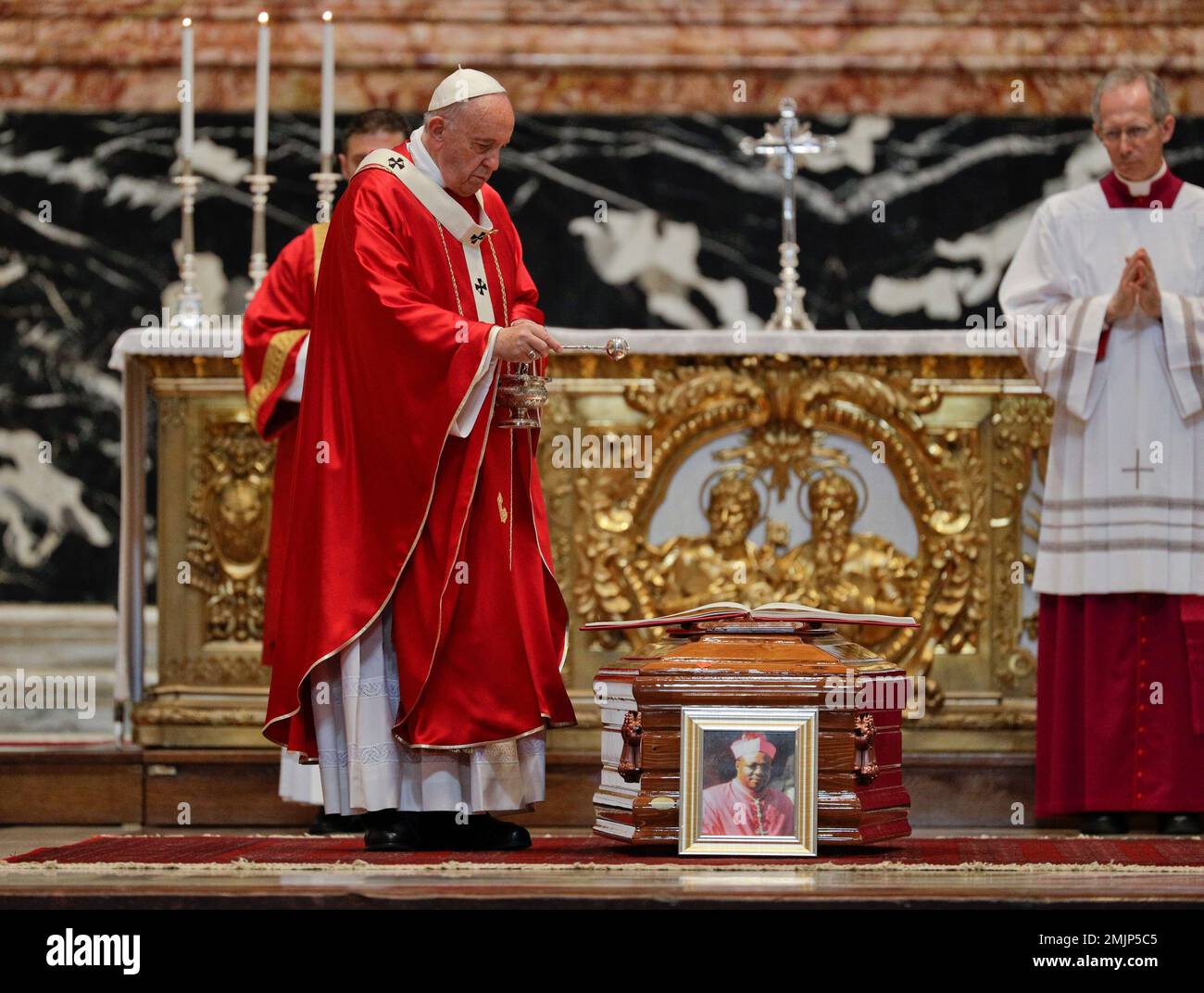 Pope Francis blesses the coffin as he celebrates the funeral service of ...