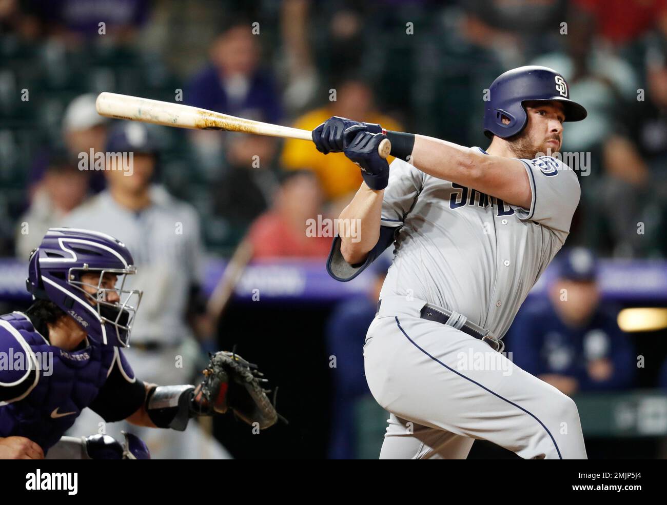 San Diego Padres pinch-hitter Austin Allen follows the flight of his ...