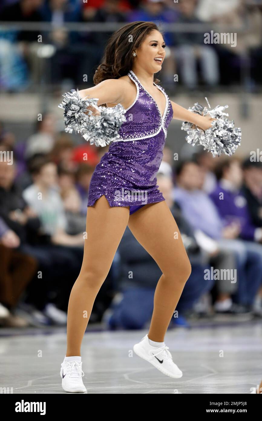 A Member Of The Tcu Showgirls Performs During An Ncaa College