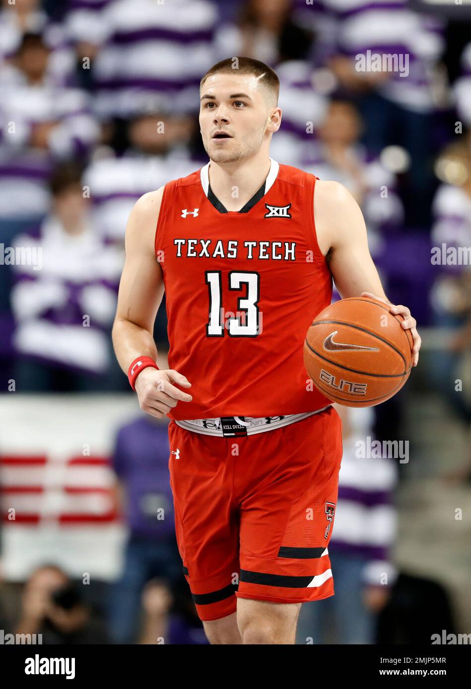 Texas Tech Red Raiders guard Matt Mooney (13) advances the ball up ...