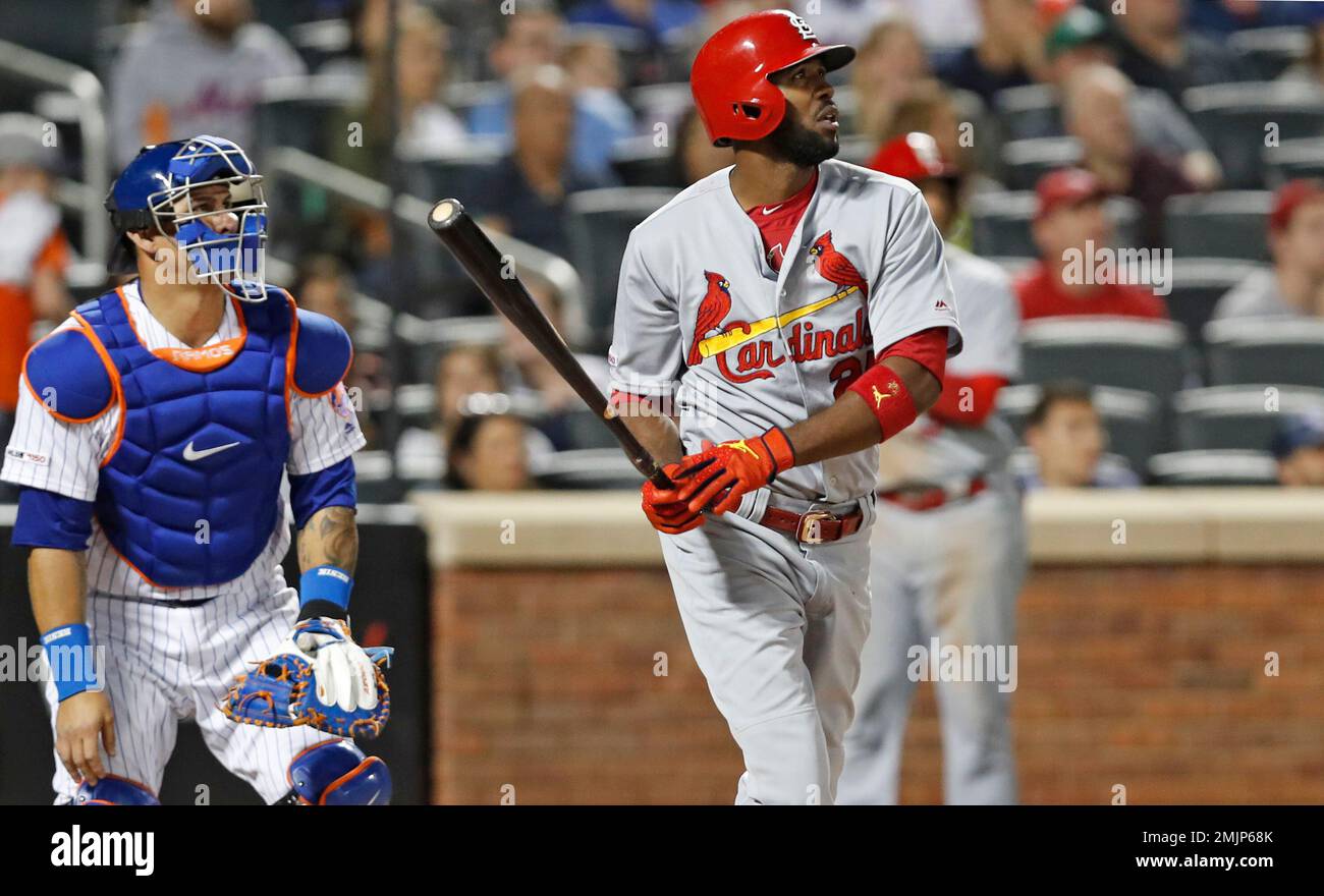 St. Louis Cardinals' Dexter Fowler watches his three-run home run, next ...