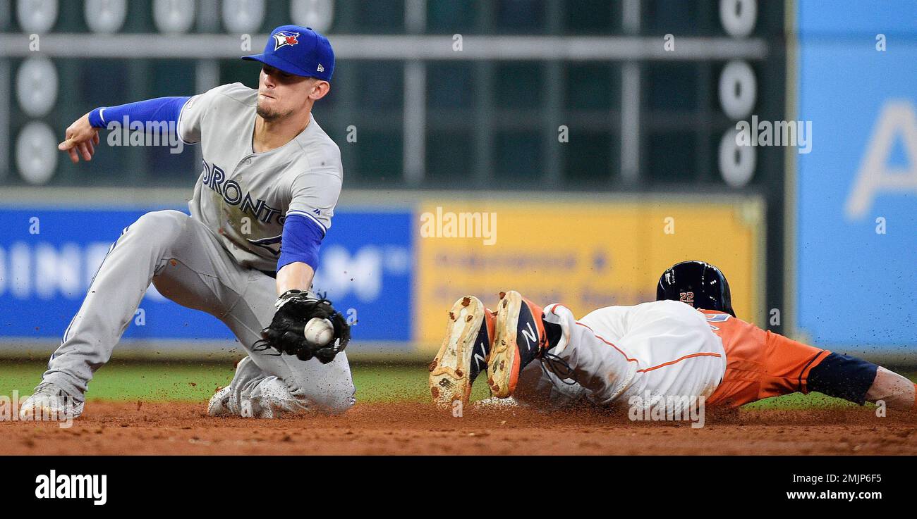 Houston Astros' Josh Reddick, right, steals second past Toronto Blue ...