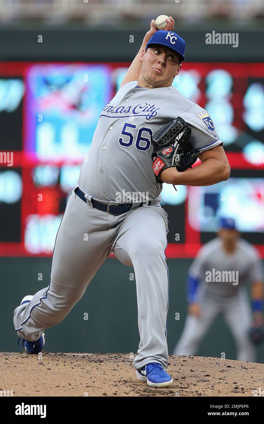 Kansas City Royals pitcher Brad Keller throws to a Minnesota Twins ...