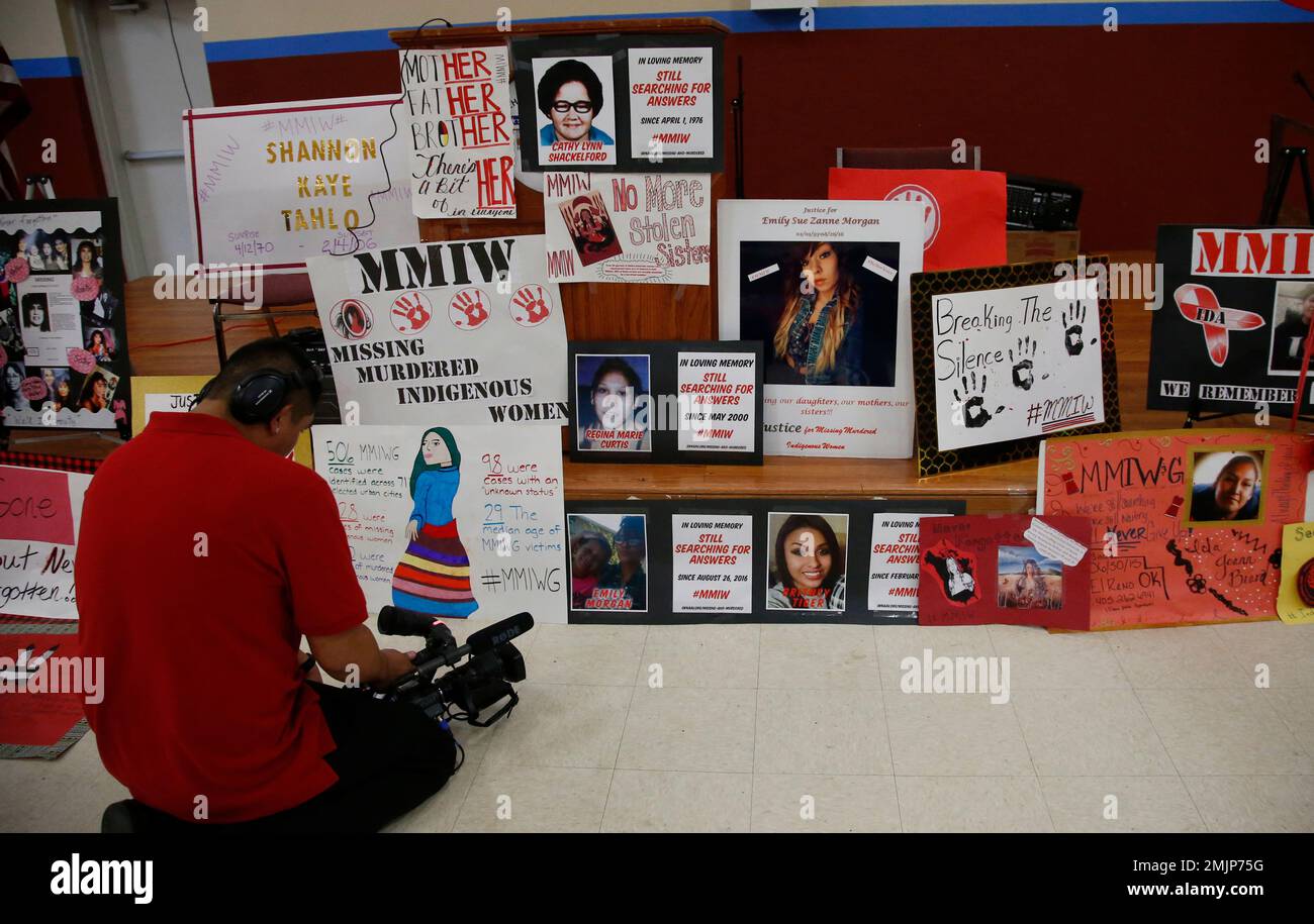 A photographer videos signs in memory of missing and murdered ...