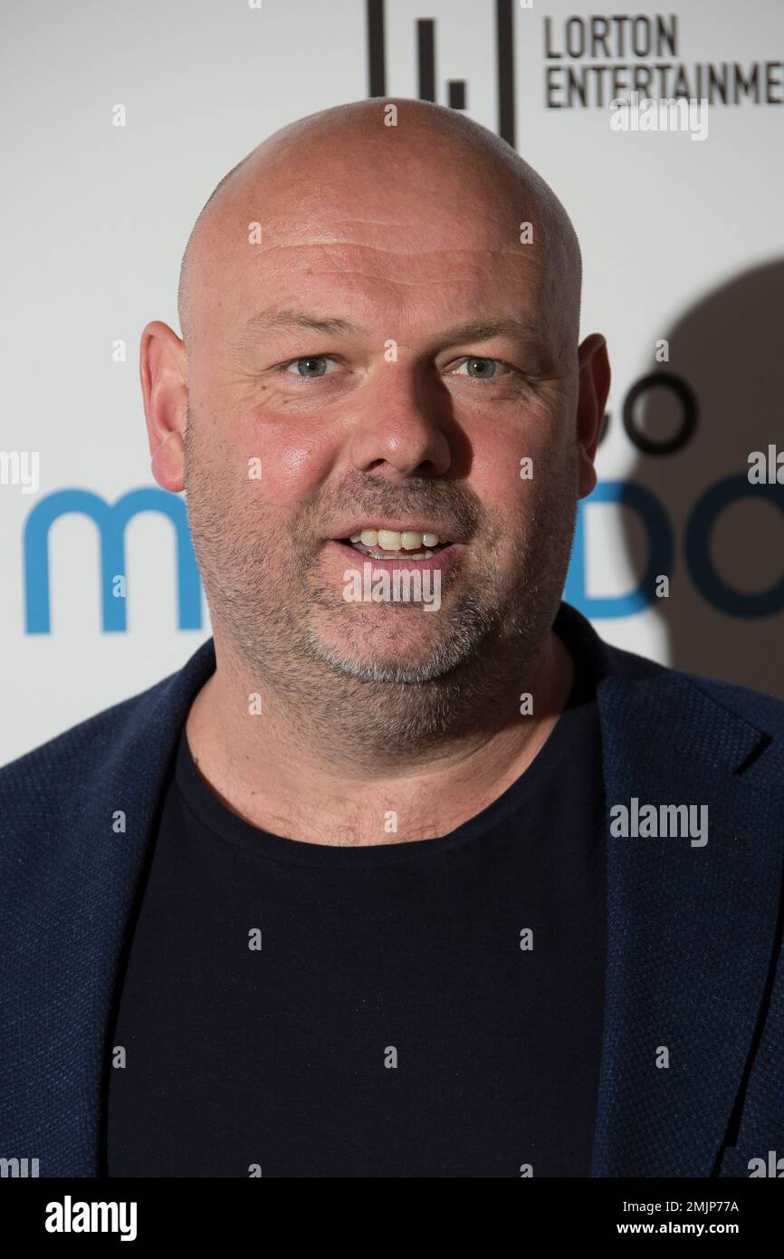 Producer Paul Martin poses for photographers upon arrival at the ...