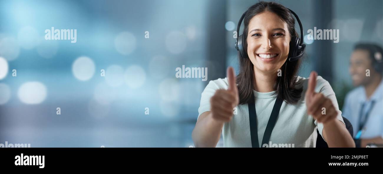 Call center girl thumbs up hi-res stock photography and images - Alamy