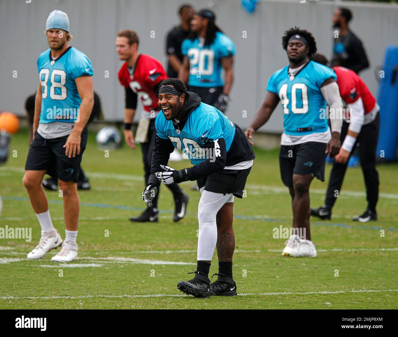 Carolina Panthers tackle Trai Turner (70) laughs during warm-ups at the ...