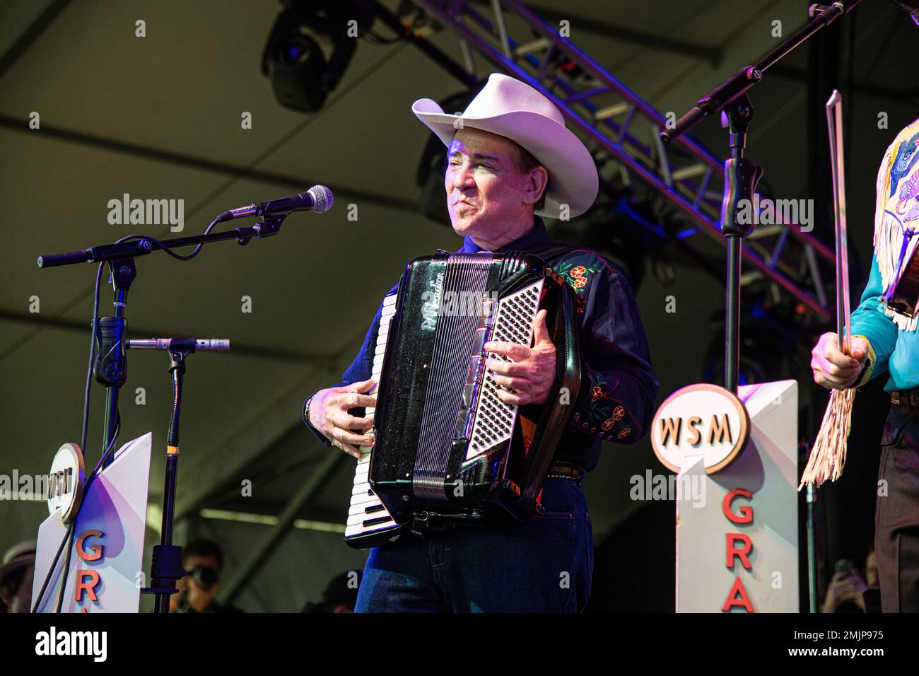 Joey Miskulin of Riders In The Sky performs during the Grand Ole Opry ...