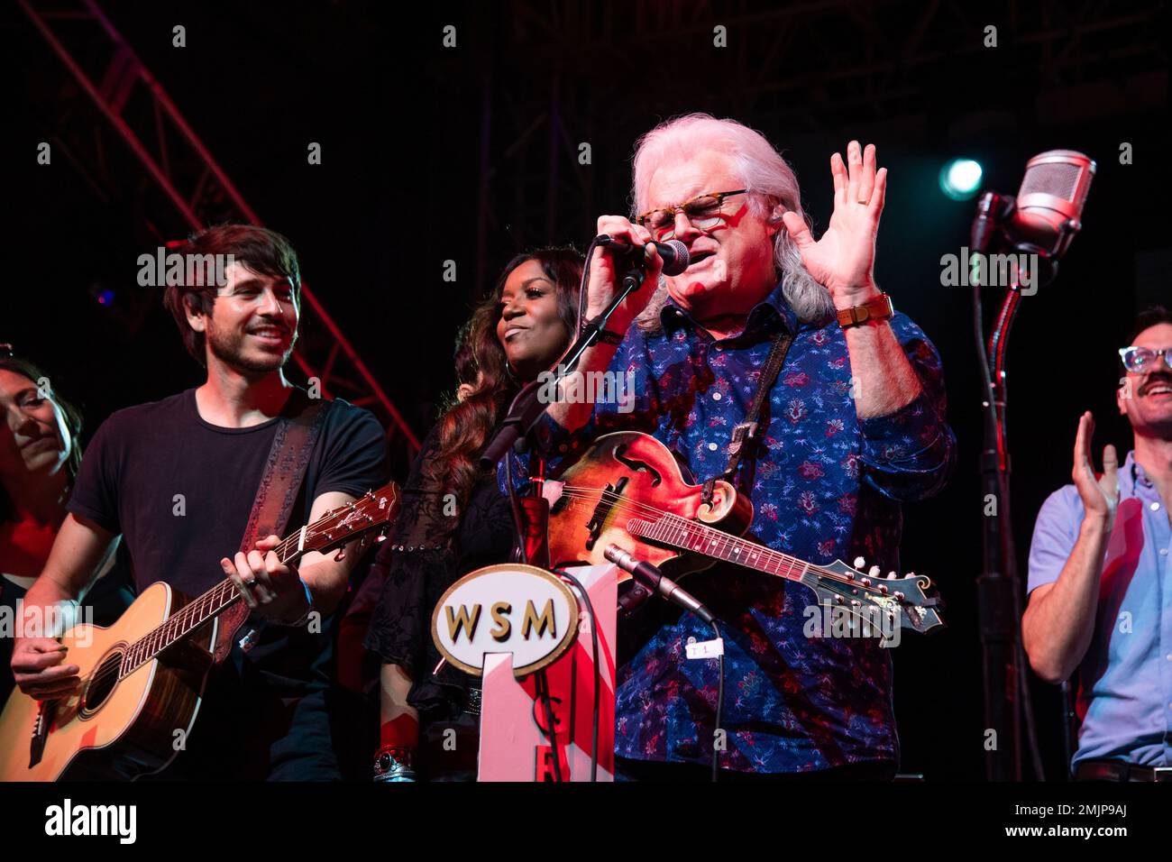 Morgan Evans, from left, Wendy Moten, and Ricky Skaggs performs during ...