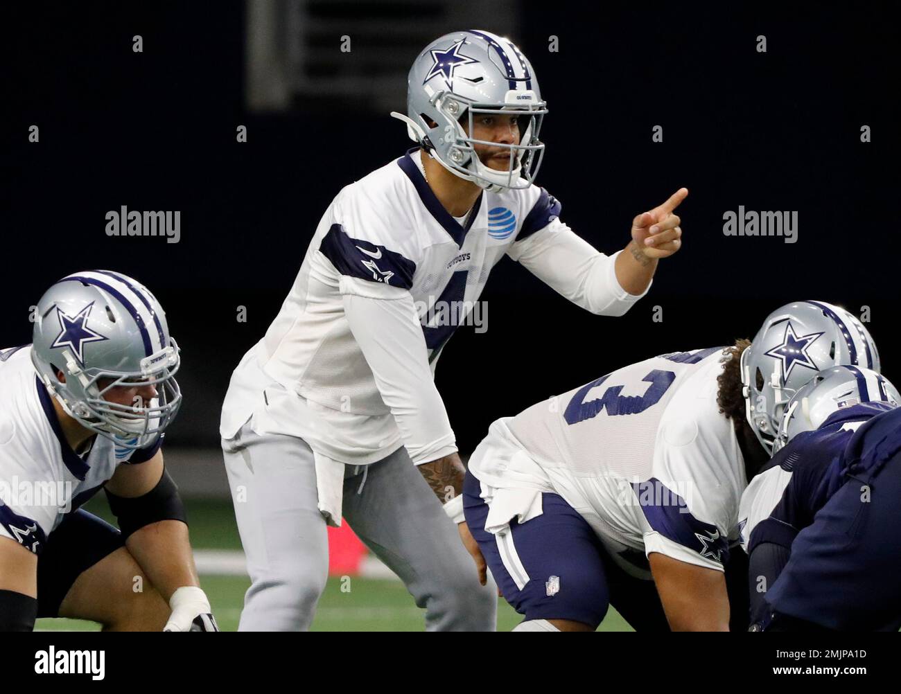 Dallas Cowboys' Dak Prescott (4) gives instructions at the line of ...