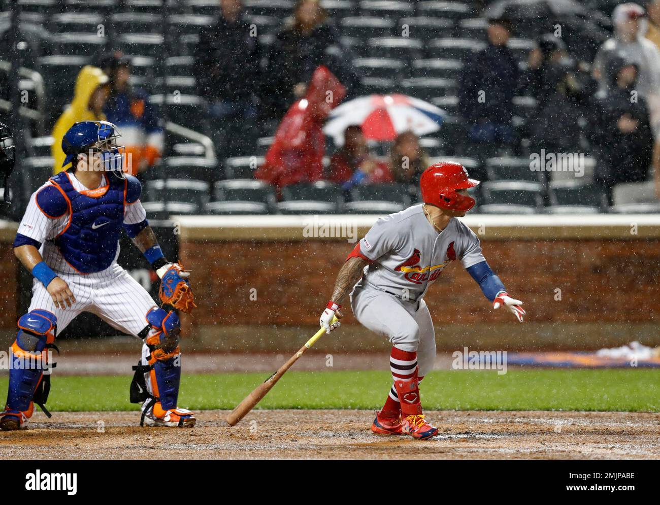 St. Louis Cardinals' Kolten Wong and New York Mets catcher Wilson Ramos ...