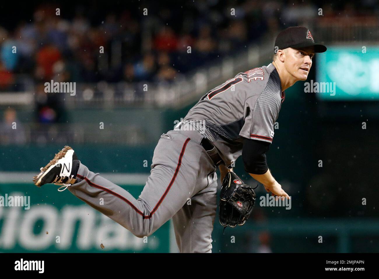 Arizona Diamondbacks starting pitcher Zack Greinke follows through on a ...