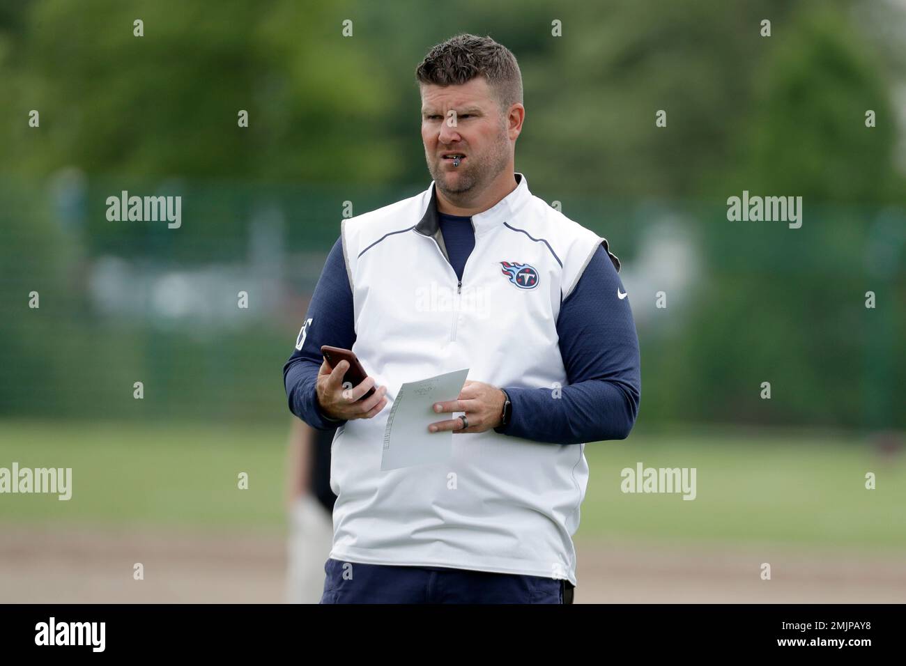 Tennessee Titans general manager Jon Robinson watches players during an ...